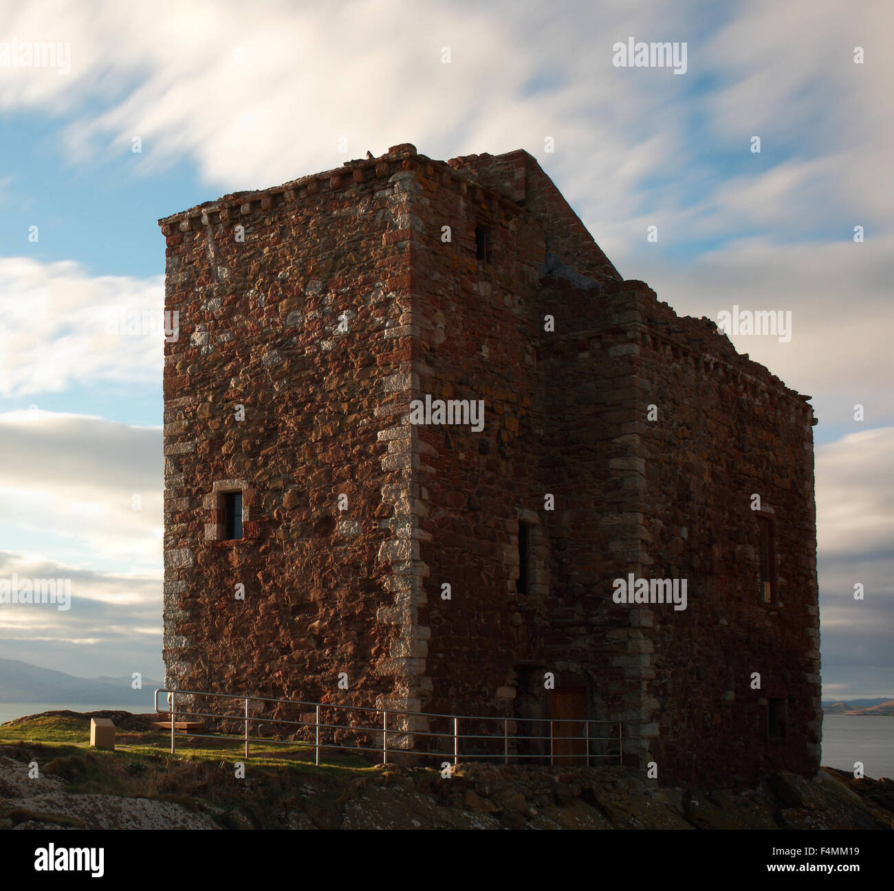Portencross Castle, half in shadow Stock Photo - Alamy
