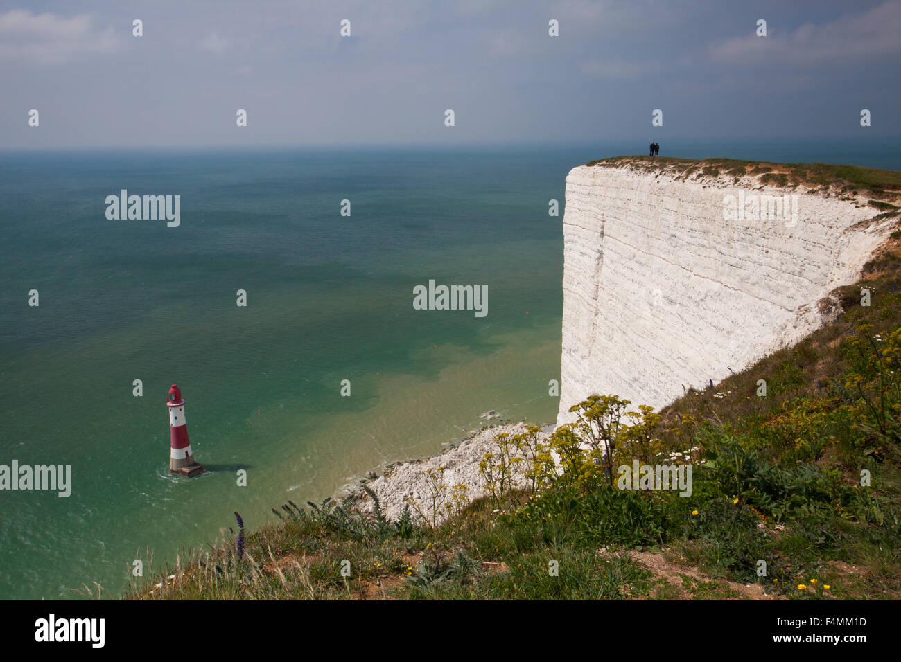 White chalk cliffs and aerial view Lighthouse Beachy Head, Eastbourne ...