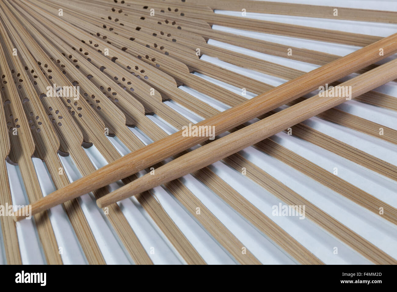 Typical Japanese hand fan made of bamboo and chopsticks Stock Photo - Alamy