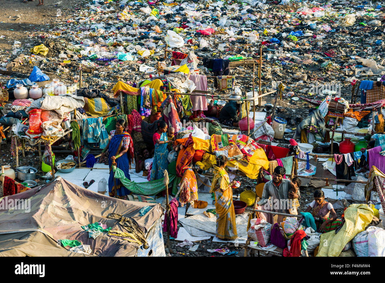 People are living under extrem conditions in huts made from iron sheets ...