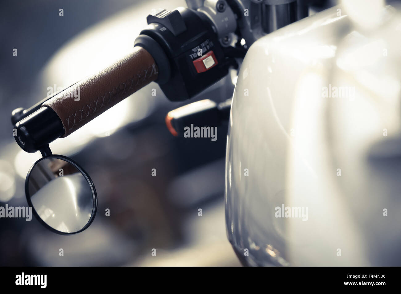 Close up shot with a motorcycle mirror on the handlebar Stock Photo - Alamy