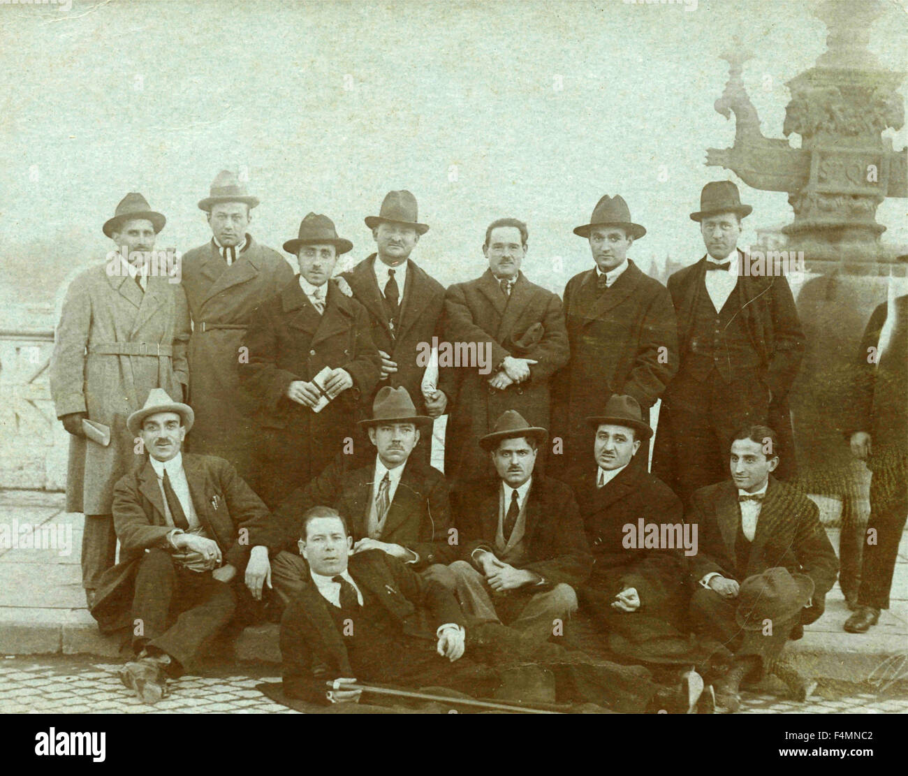 Group of men in the street, Italy Stock Photo - Alamy