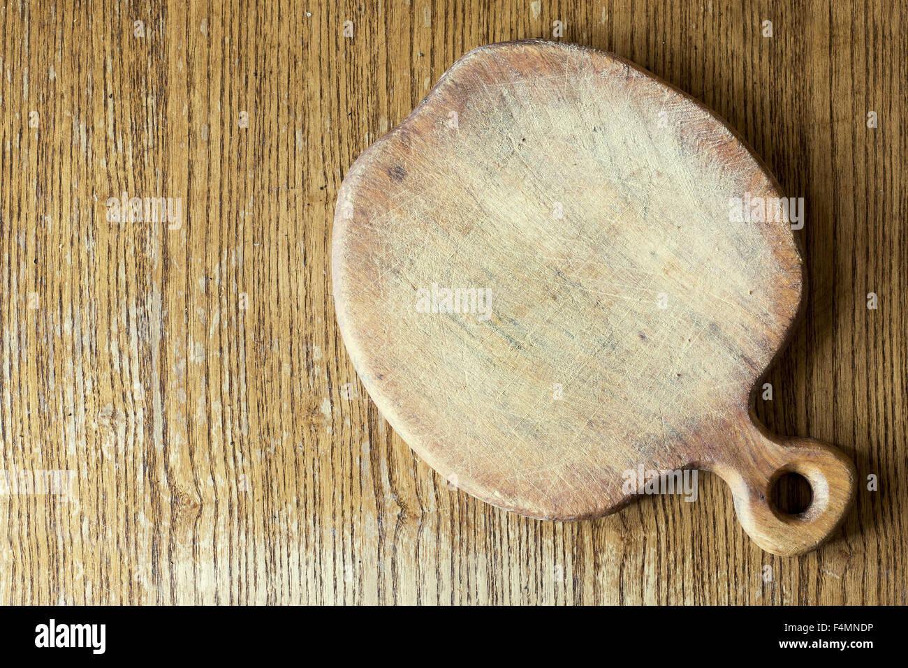 old wooden apple shape cutting board on the table Stock Photo - Alamy