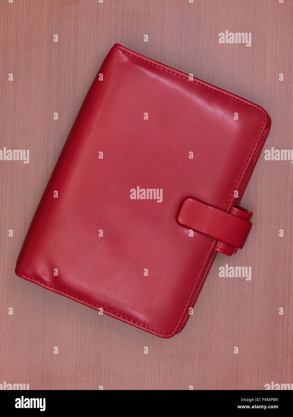 Red business binder hi-res stock photography and images - Alamy