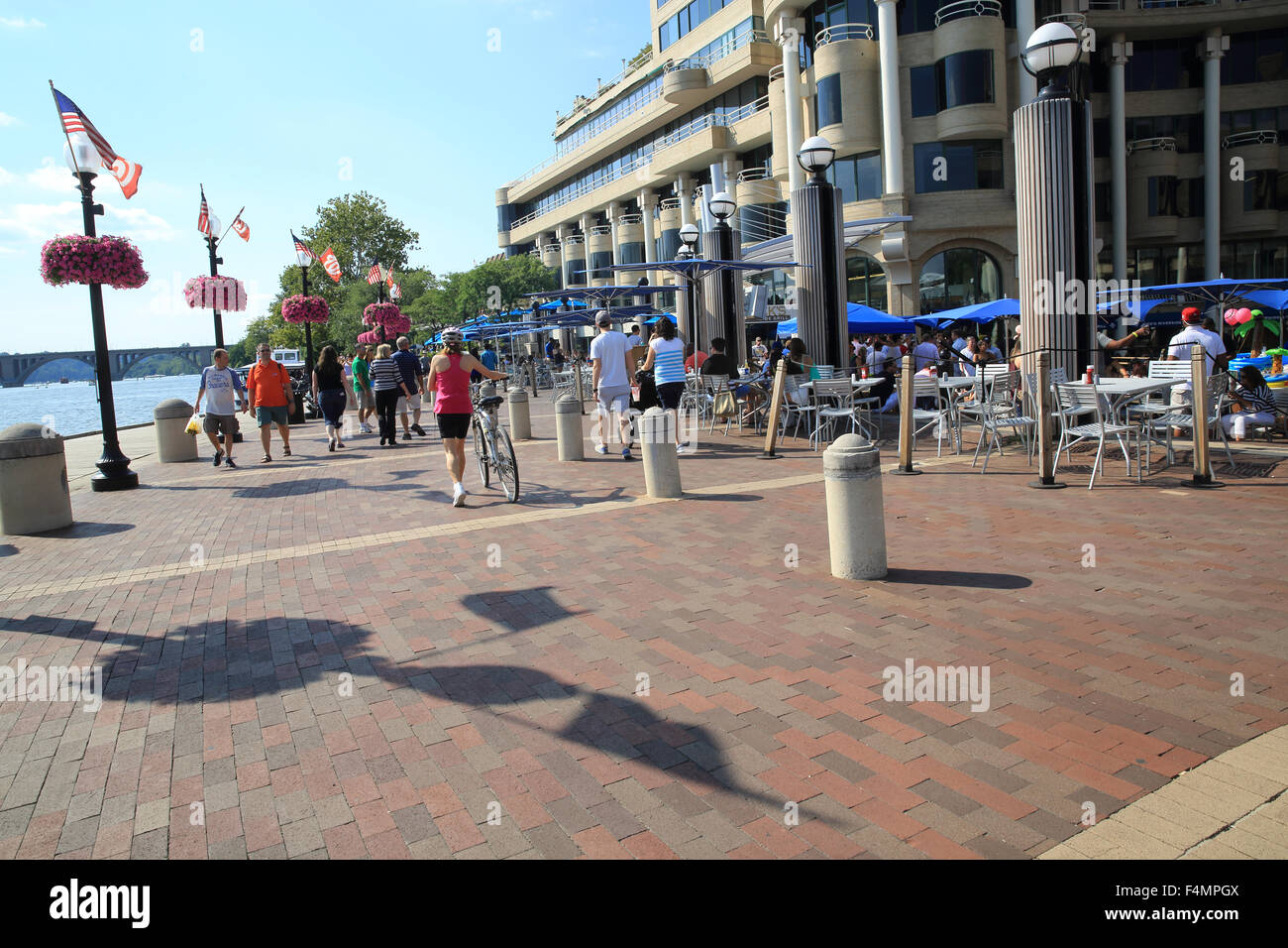 Strolling along the Washington DC Harbour on the Potomac River, in ...