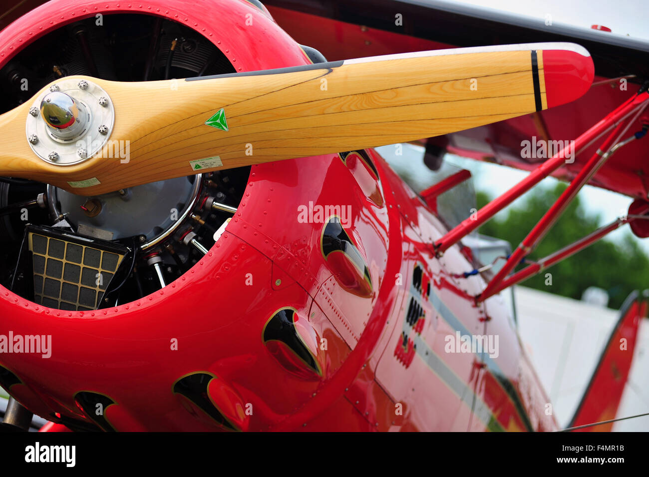 A wooden propeller on the front of a red biplane at the Goodwood ...