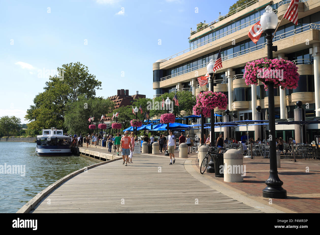 Strolling along the Washington DC Harbour on the Potomac River, in ...
