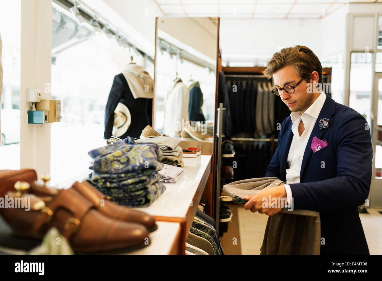 Well Dressed Sales Clerk High Resolution Stock Photography and Images ...