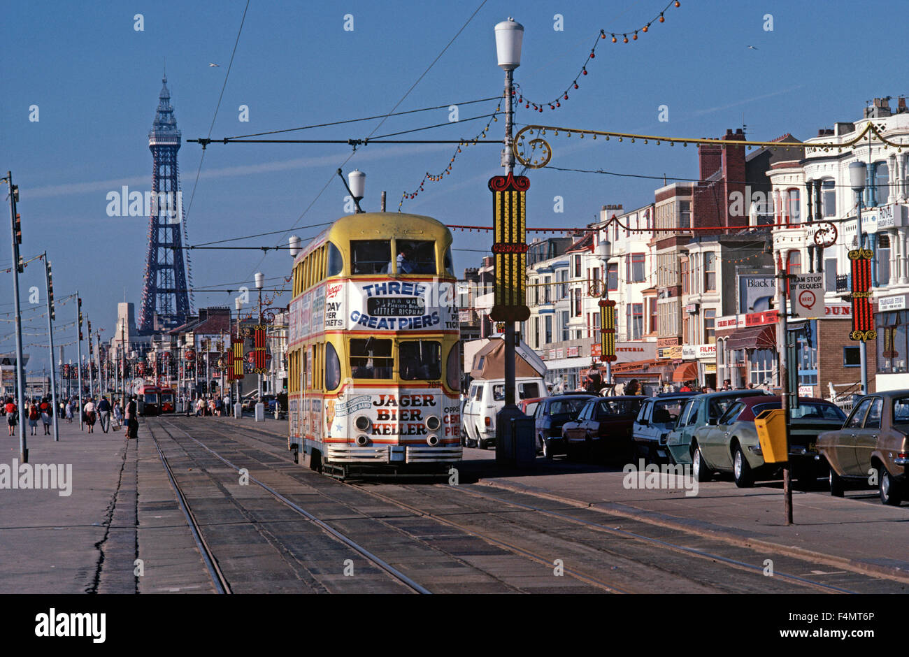 Blackpool trams on promenade with Blackpool Tower in background ...