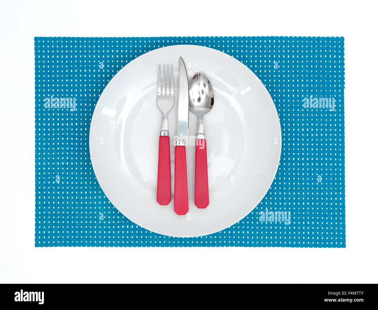 A close up photo of a table place mat setting Stock Photo - Alamy
