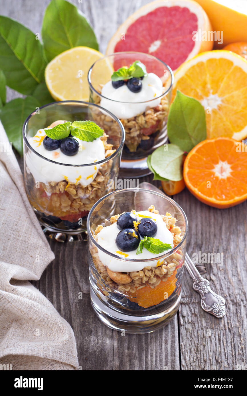 Granola breakfast parfait with citrus compote and blueberries Stock ...