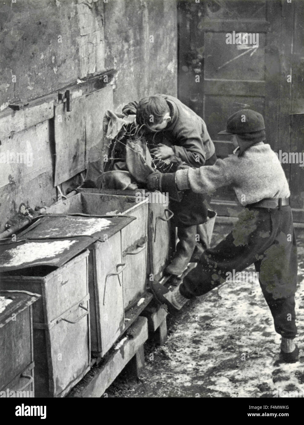 Children looking for something in rubbish hi-res stock photography and ...