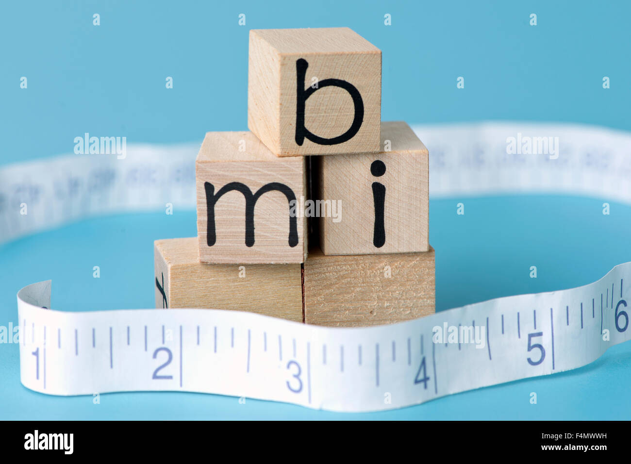 BMI body mass index letter blocks with tape measure Stock Photo - Alamy