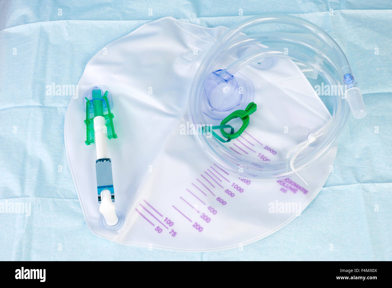Urinary catheter with drainage bag on sterile drape Stock Photo - Alamy