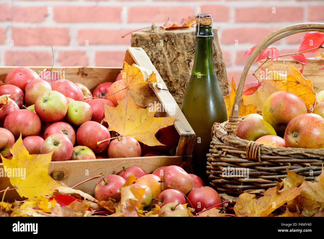 a bottle of Normandy Cider, with many apples and basket Stock Photo - Alamy