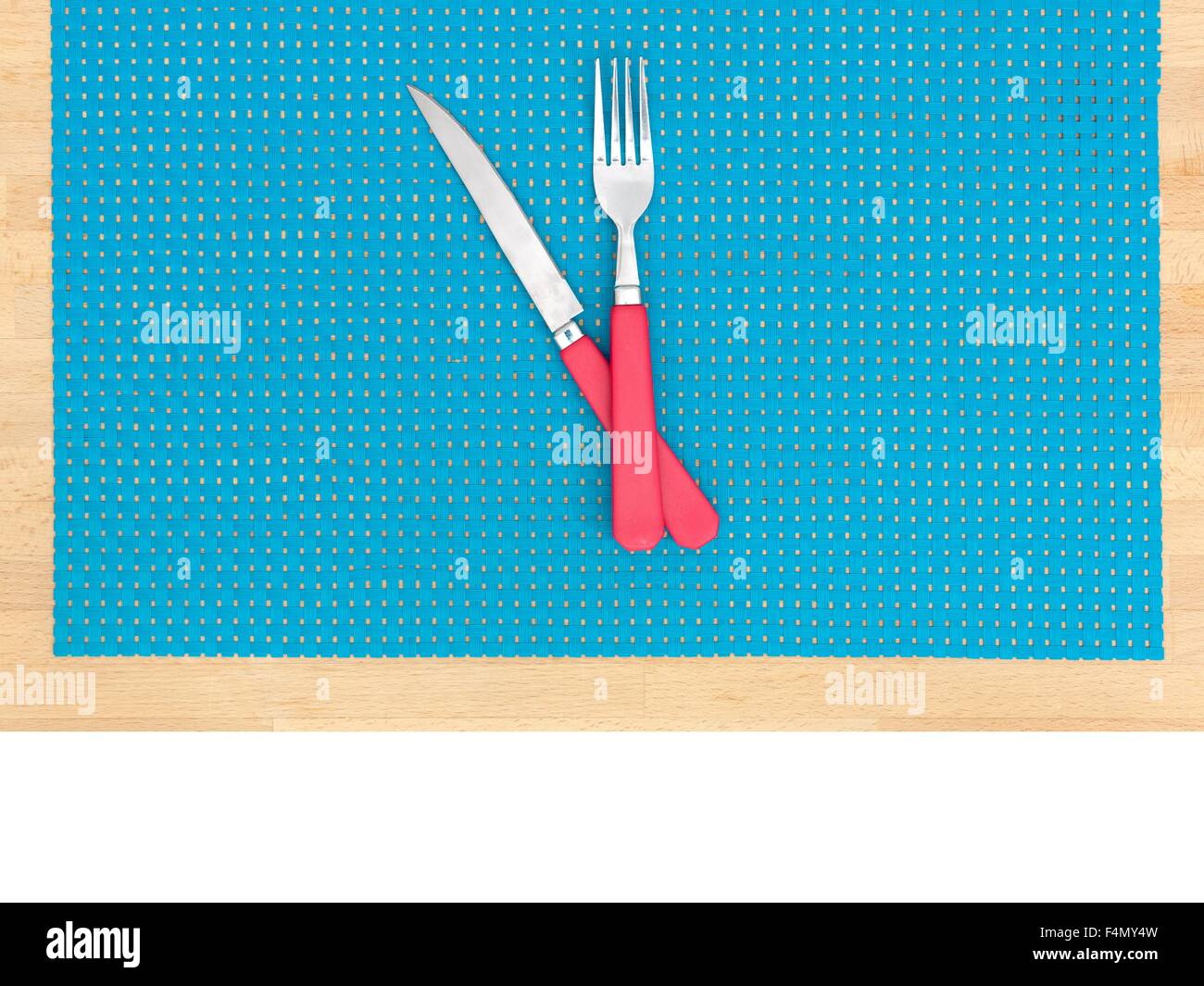 A close up photo of a table place mat setting Stock Photo - Alamy
