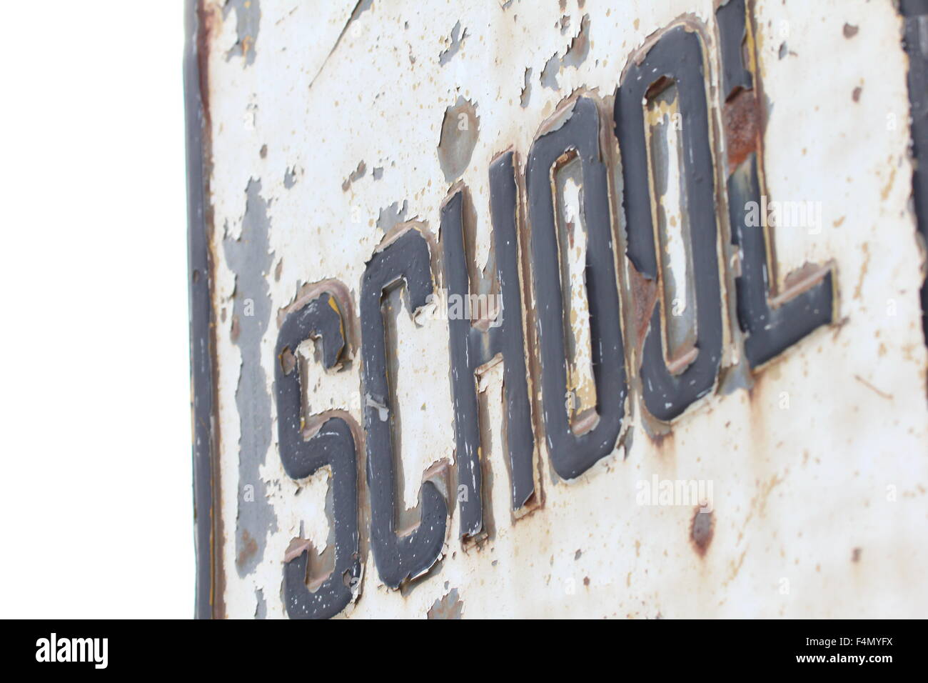 Rusty metal school sign Stock Photo - Alamy