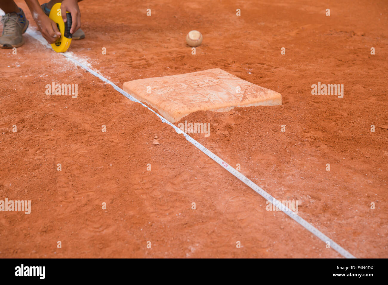 measuring the base distance of a baseball field Stock Photo - Alamy