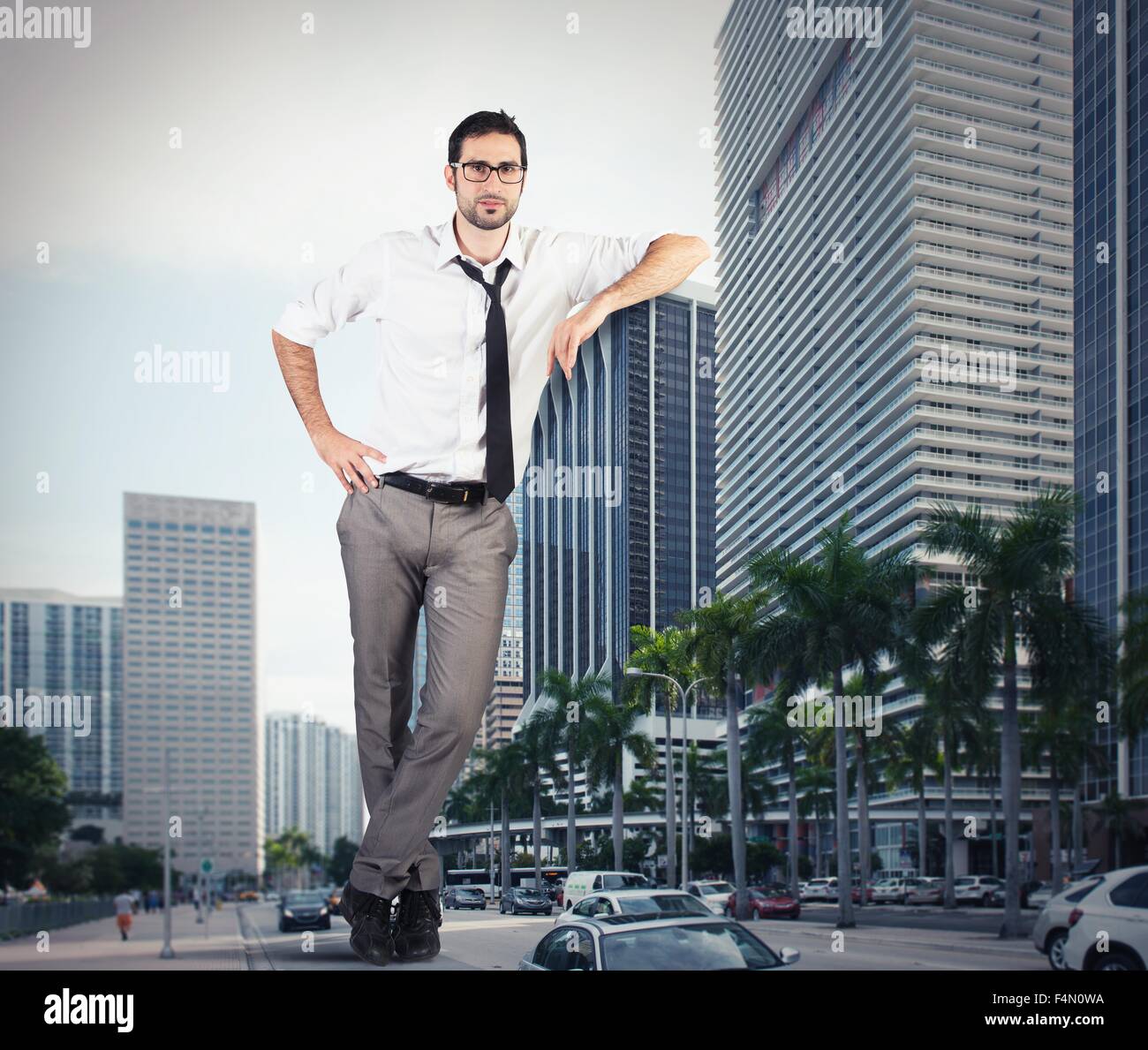 Giant successful businessman Stock Photo - Alamy