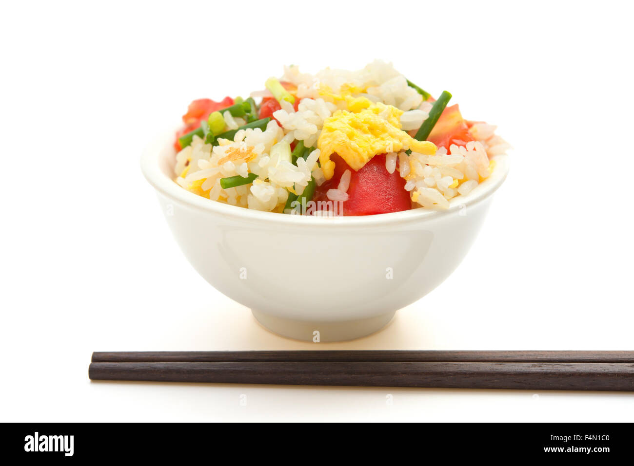 chinese cuisine - homemade fried rice with tomatoes and egg with chop ...