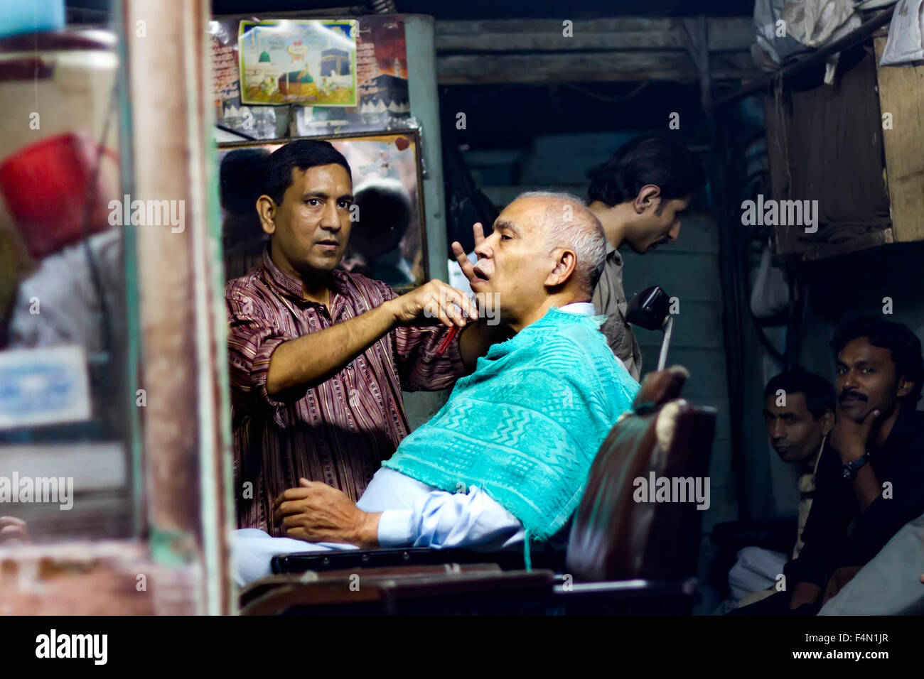 A traditional barber shop at anarkali bazaar in Lahore, Pakistan Stock ...