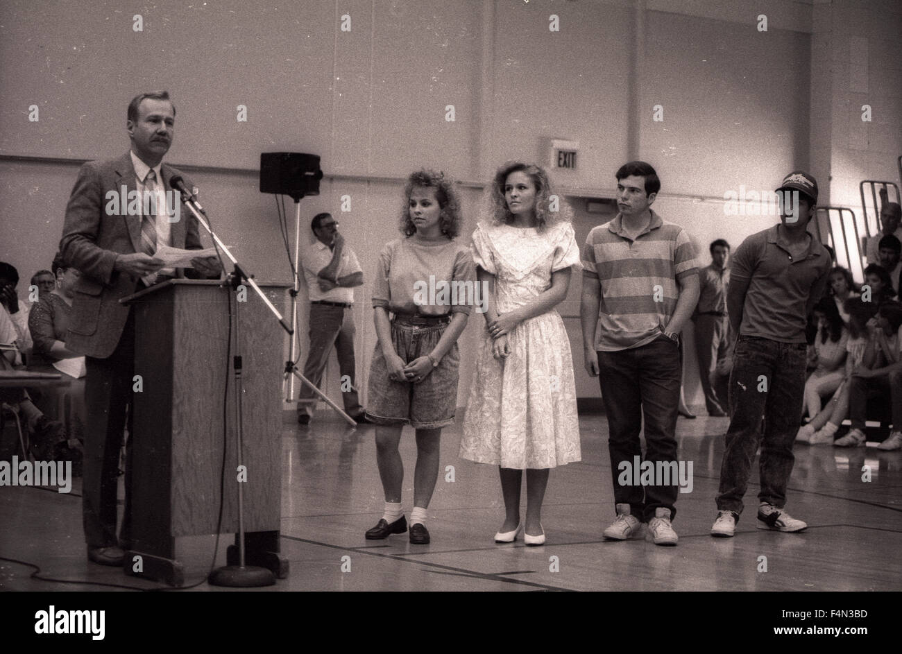 Students line up at podium during a pep rally at Monache High School ...