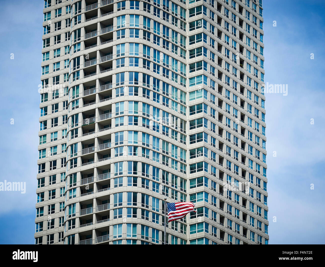 USA, Illinois, Chicago, High-rise building, American flag Stock Photo ...
