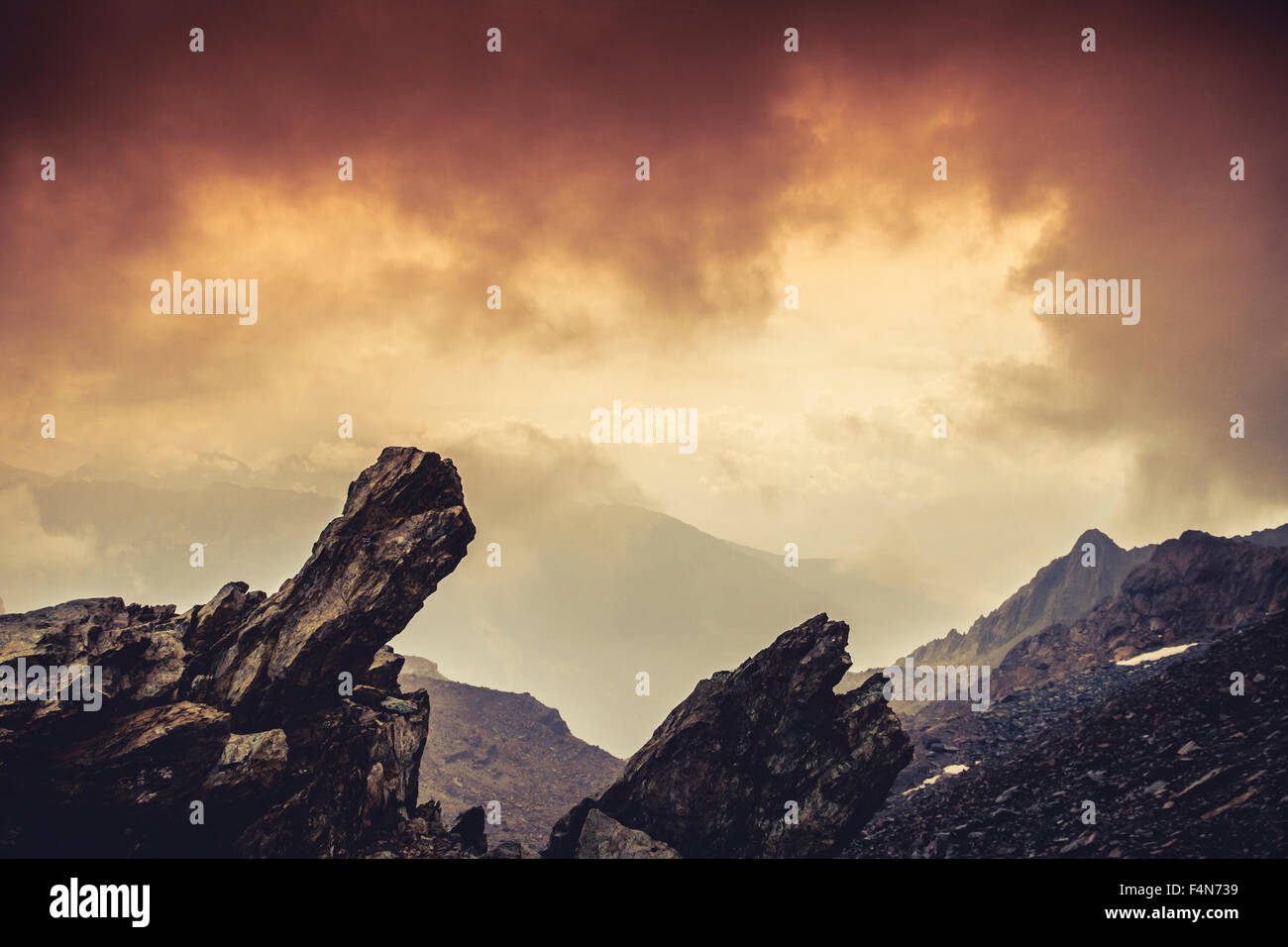 Italy, Lombardy, Alps, Rocks at sunset, textured effect Stock Photo - Alamy