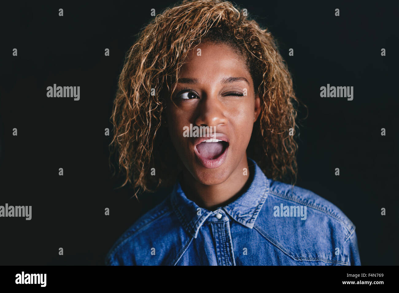 Squinting one eye hi-res stock photography and images - Alamy