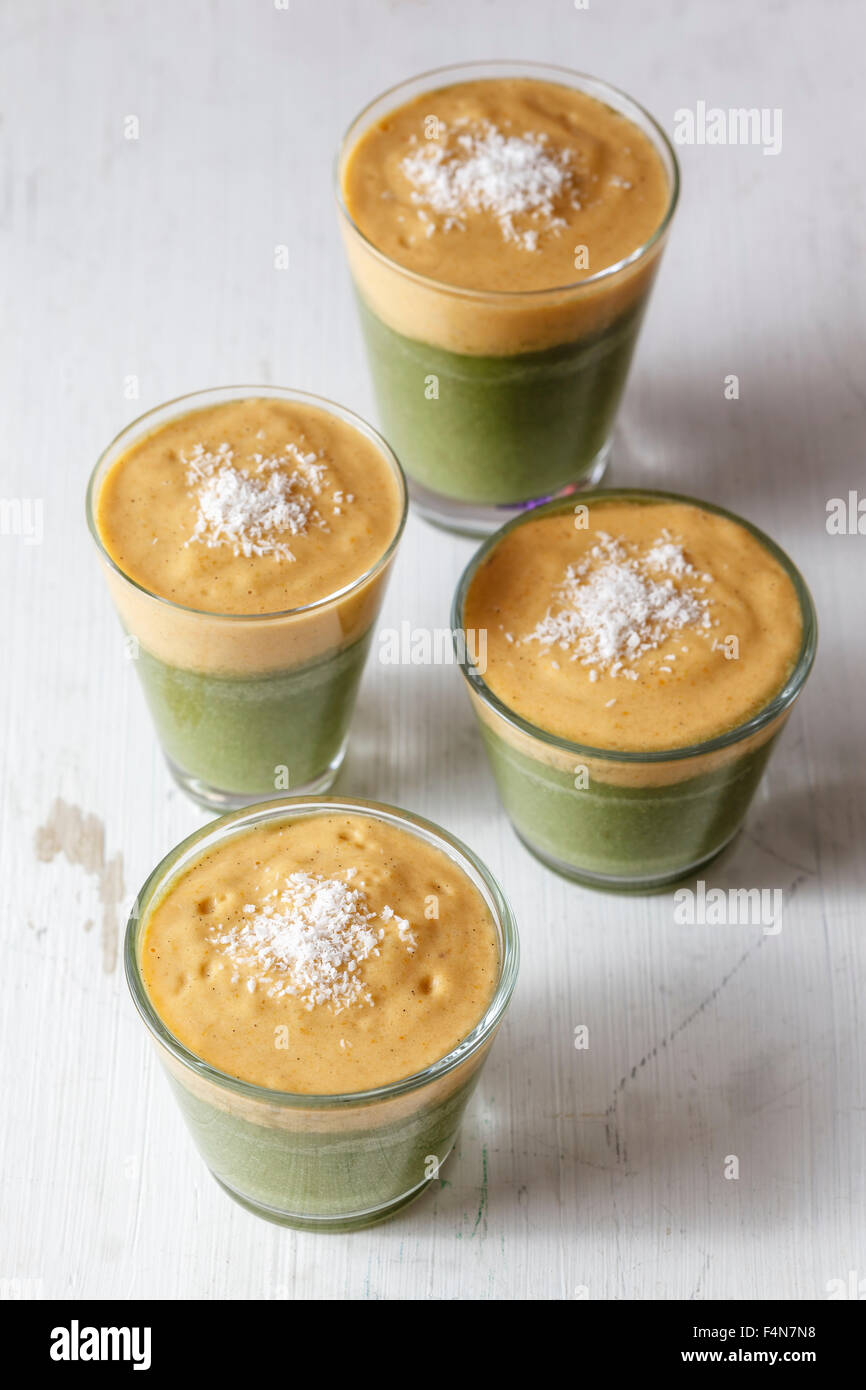 Green smoothies, dessert with vanilla sauce, raw food Stock Photo - Alamy