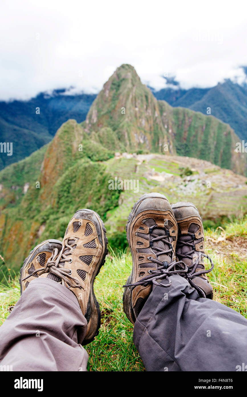 Peru, Machu Picchu region, Travelers looking at Machu Picchu citadel ...
