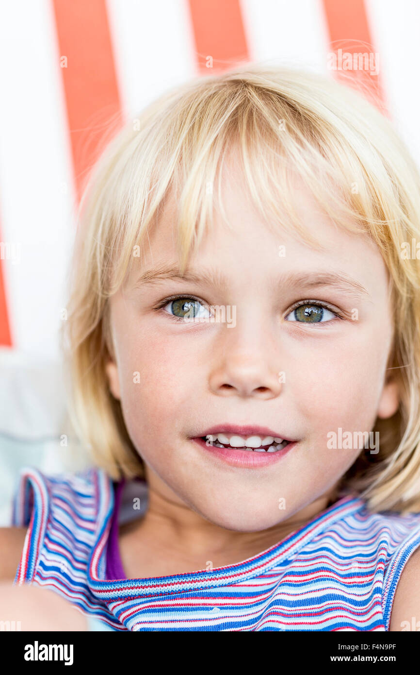 Portrait of smiling blond girl Stock Photo - Alamy