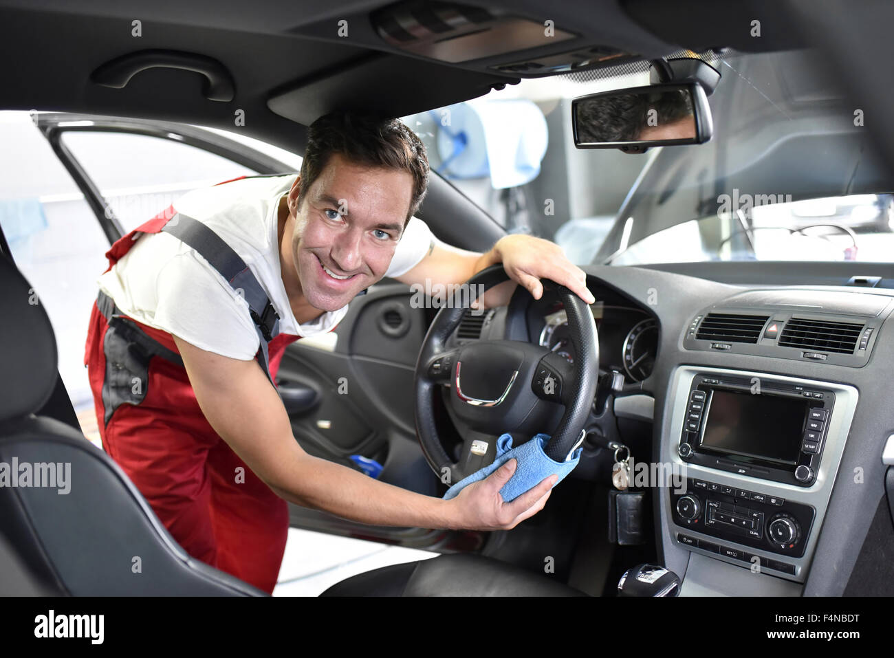 Car cleaning, man cleaning car, vehicle interior Stock Photo - Alamy