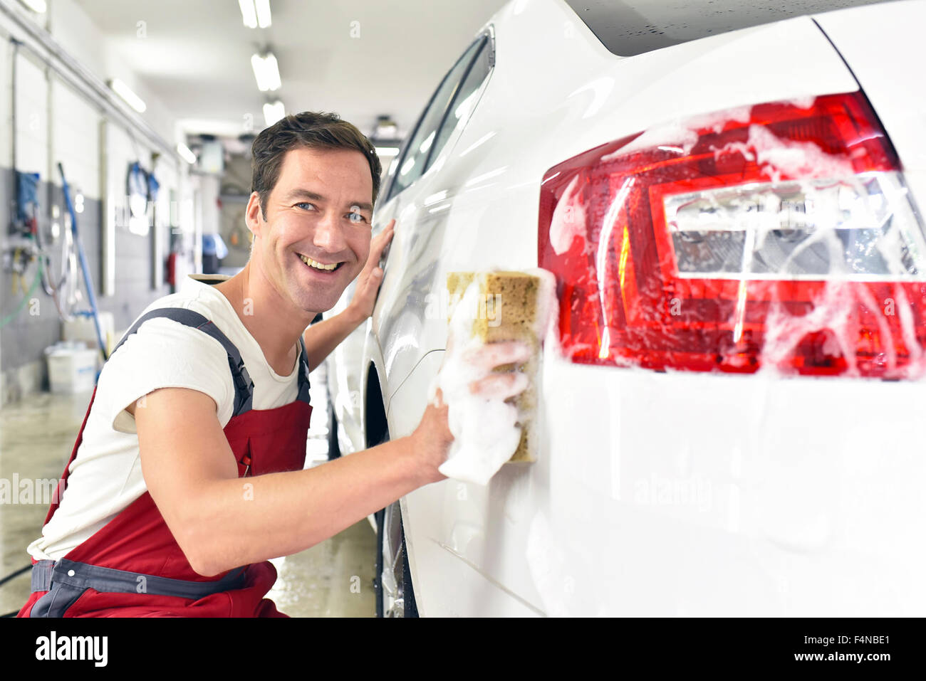Car cleaning, man cleaning car Stock Photo - Alamy