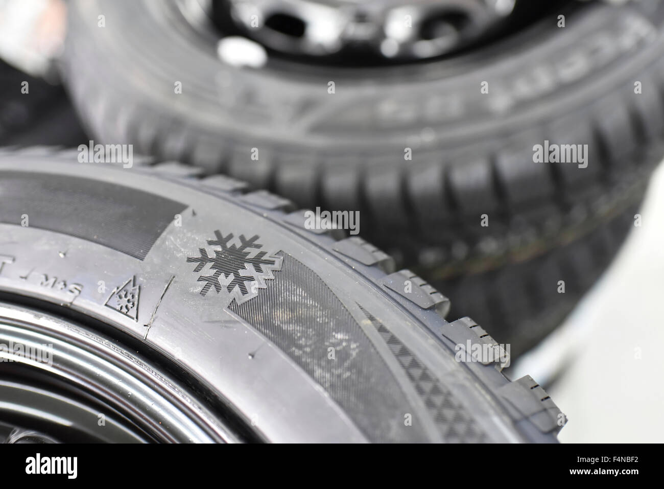 Winter tires, symbol snowflake Stock Photo - Alamy
