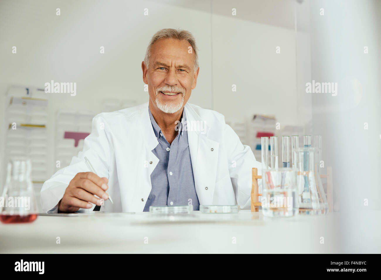 Portrait of smiling scientist in lab Stock Photo - Alamy