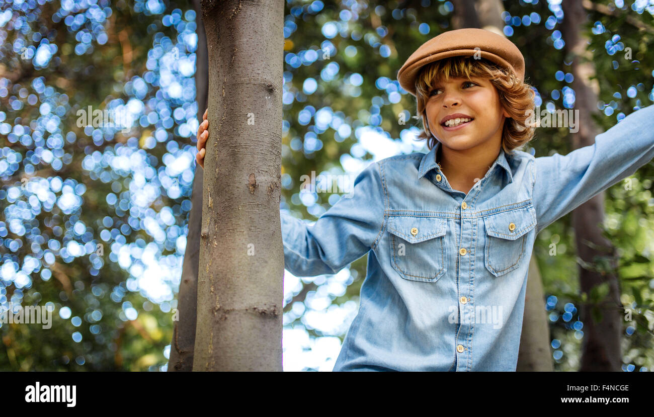 Portrait of blond boy wearing cap Stock Photo - Alamy