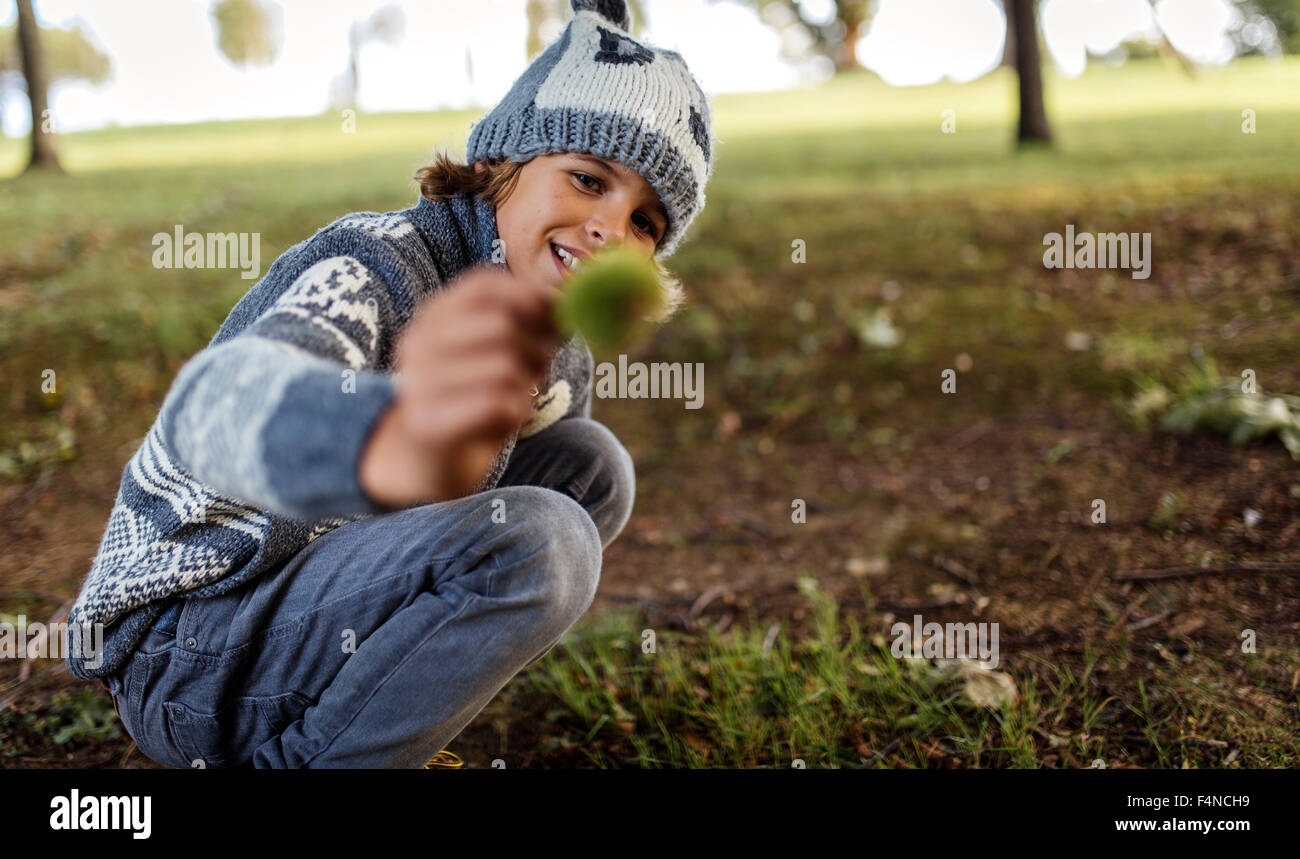 Childhood holding crouching food and drink hi-res stock photography and ...