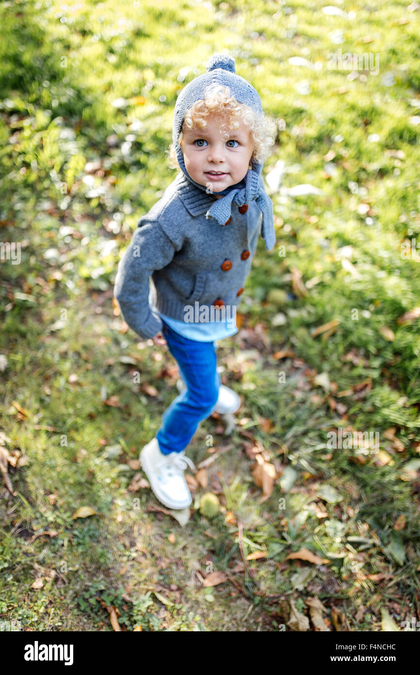Portrait of little boy wearing autumn fashion Stock Photo - Alamy