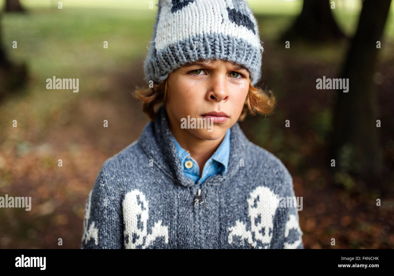 Portrait of angry boy wearing autumn fashion Stock Photo - Alamy