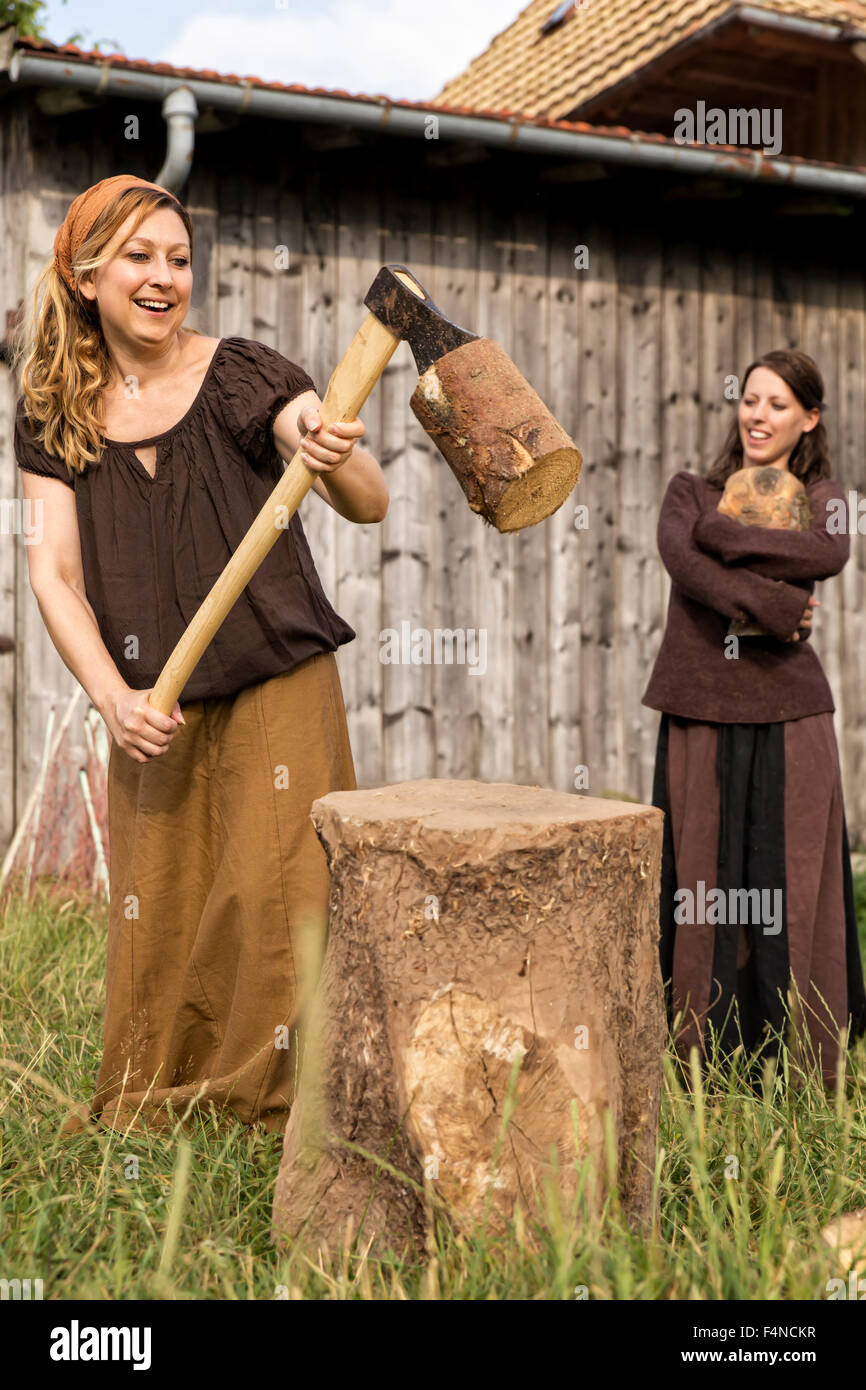 Chopping wood rural scene hi-res stock photography and images - Alamy