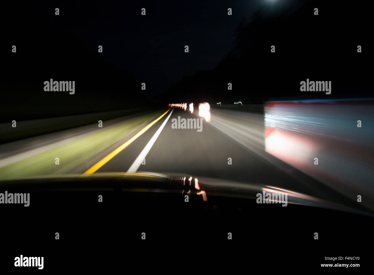 Car driving on high street side view hi-res stock photography and ...