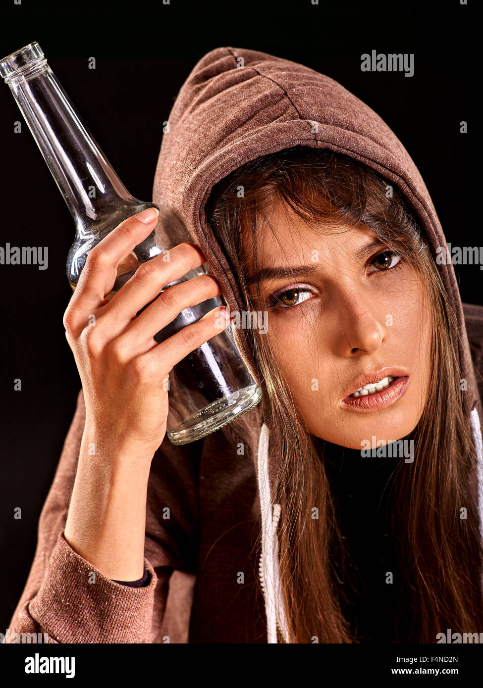Drunk girl holding bottle vodka hi-res stock photography and images - Alamy