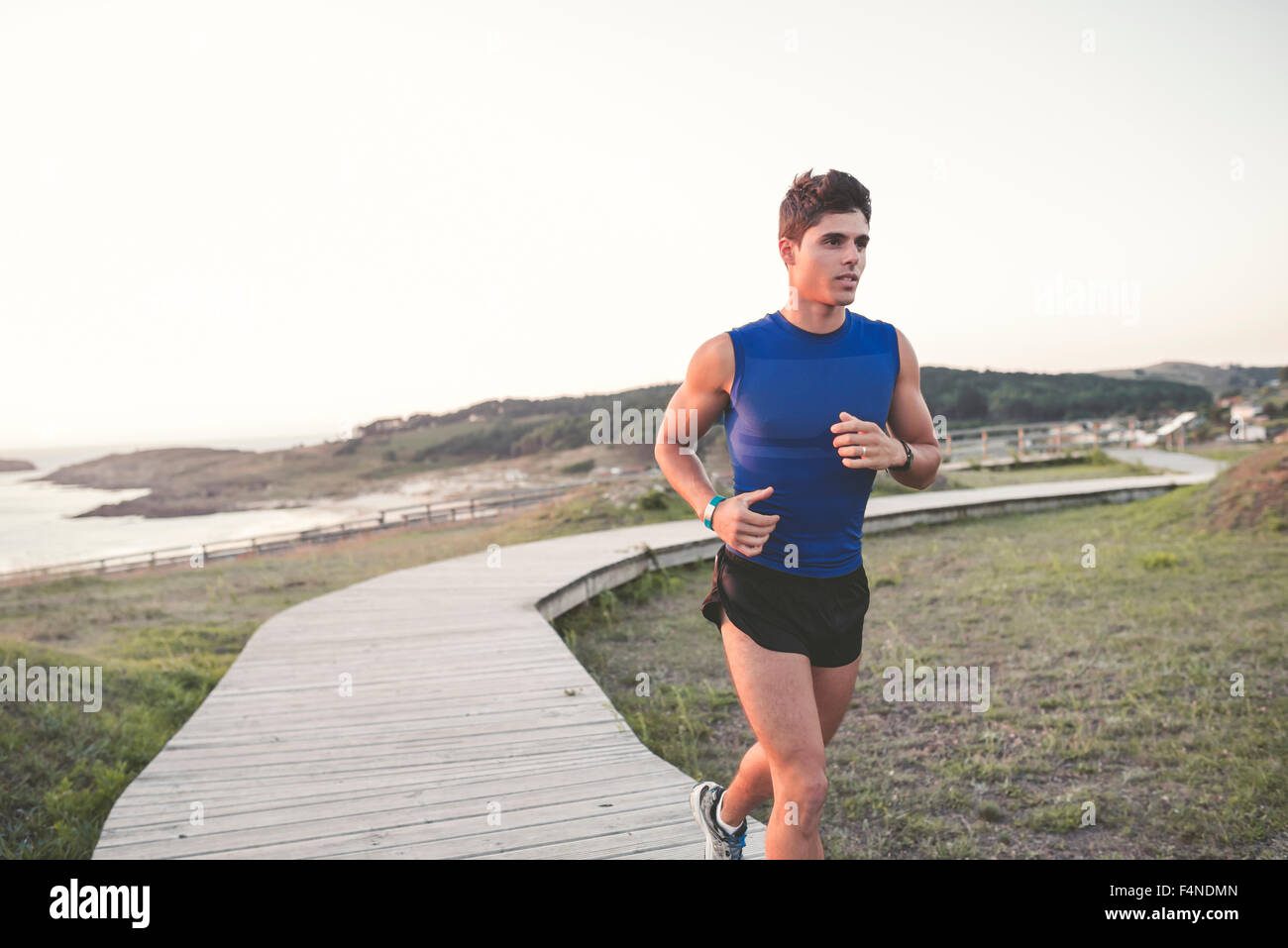 Jogger running on a boardwalk hi-res stock photography and images - Alamy