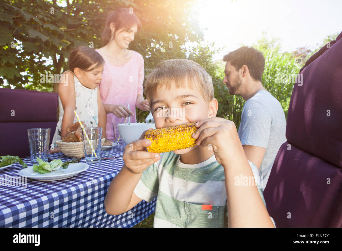 Woman child eating corn cob hi-res stock photography and images - Alamy