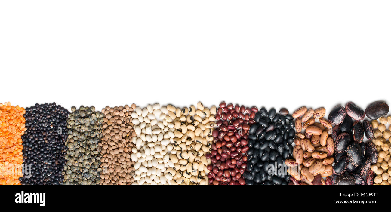 various dried legumes on white background Stock Photo - Alamy