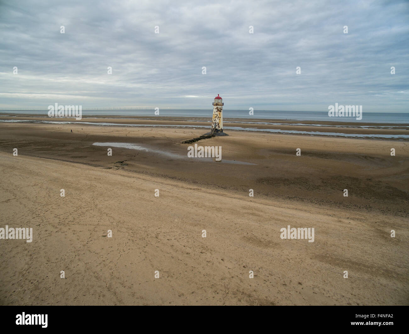 Derelict lighthouse at low tide Stock Photo - Alamy