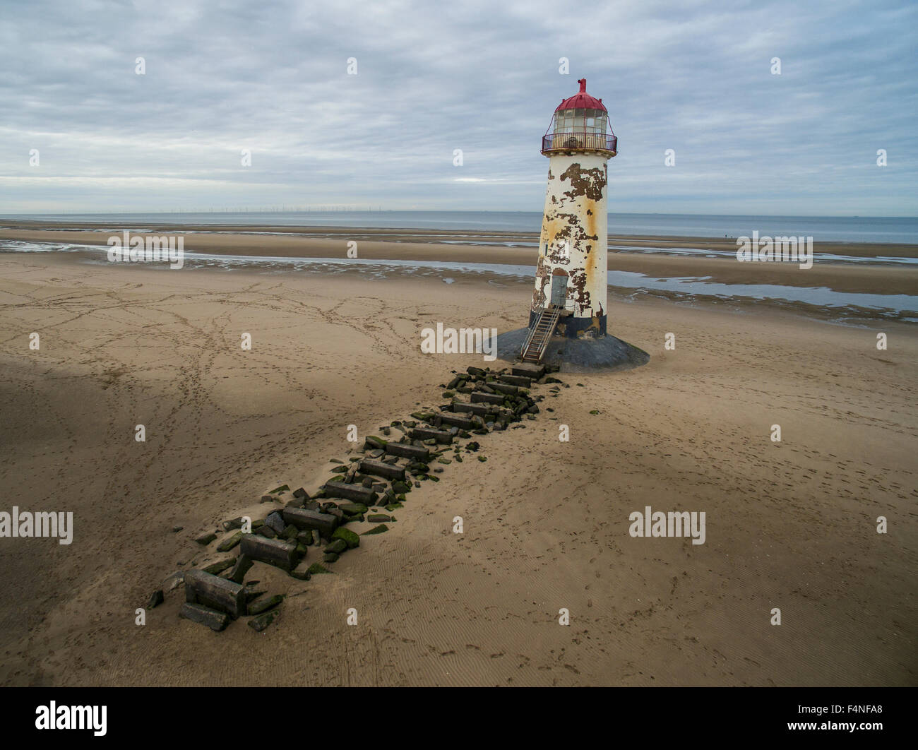 Derelict lighthouse at low tide Stock Photo - Alamy