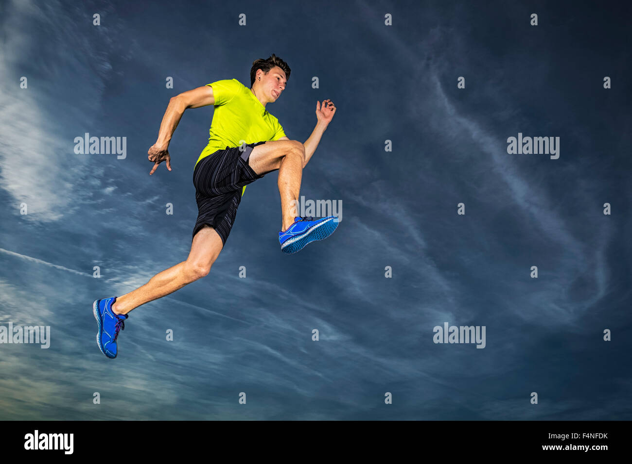 Long jumper in the air Stock Photo - Alamy