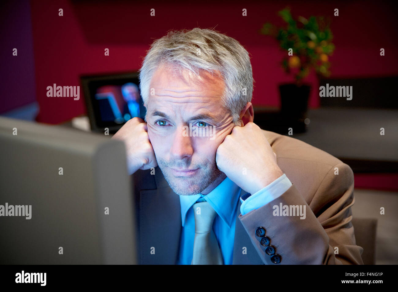 Staring at monitor hi-res stock photography and images - Alamy